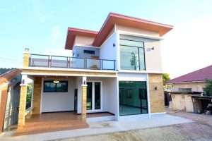 Two-Storey House Plan with Large Glass Panels - Pinoy House Designs